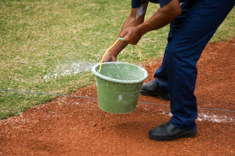 Drawing a Line for a Softball Field Stock Image - Image of drawing ...