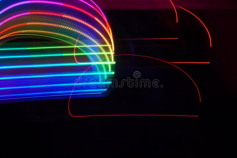 Drawing of a Neon Line. Abstract Lines Isolated on a Black Background ...