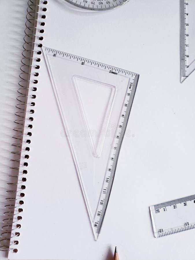 Drawing Notebook with Blank Sheet, Set of Geometry Objects and Tip of a ...