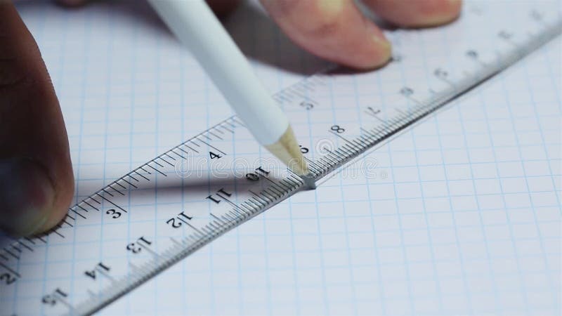 Drawing in a Notebook with a Pencil Under a Ruler, Engineering Work ...