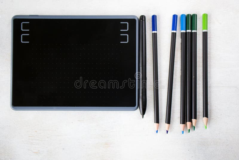 Drawing and Painting Tablet and Styles Pen and Pencils on the White ...