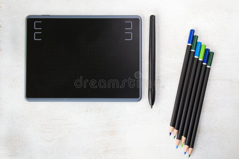 Drawing and Painting Tablet and Styles Pen and Pencils on the White ...