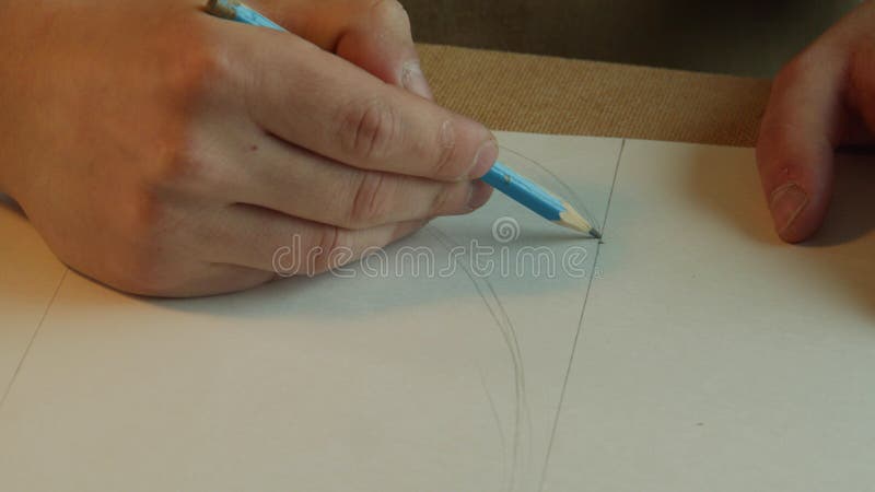 Drawing Patterns in Pencil on White Paper Close-up. Concept of Work in ...