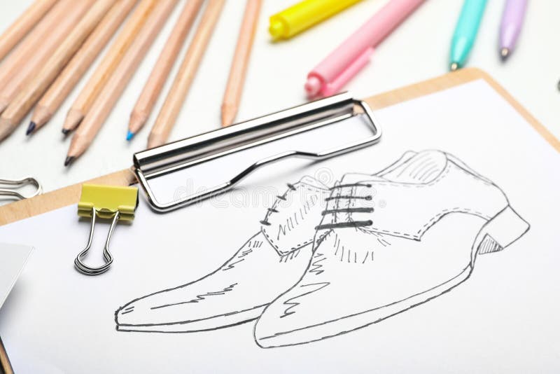 Drawing of Shoes on Table. Designer`s Workplace Stock Image - Image of ...