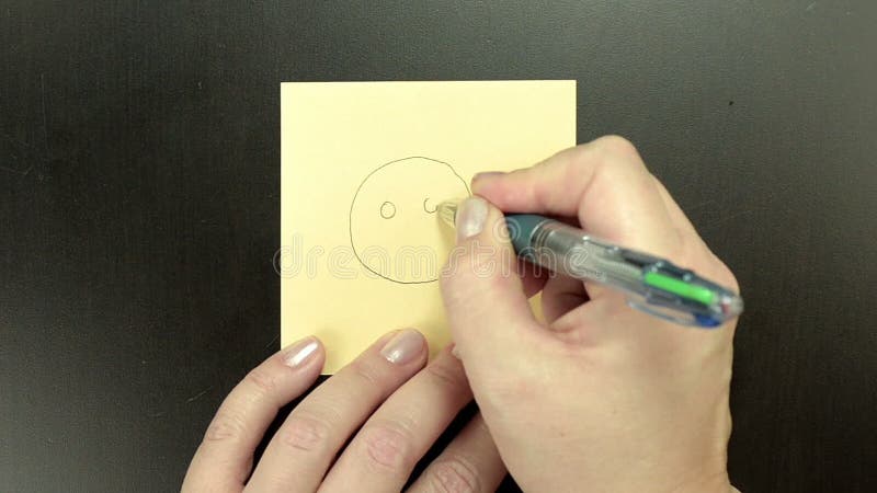 Drawing the symbol Smug stock video. Video of sketch - 52222873