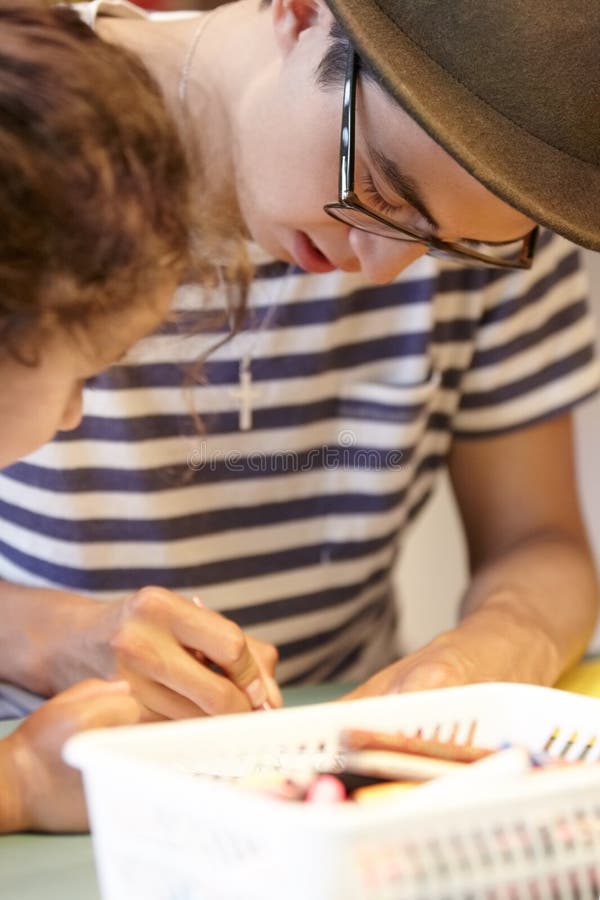 Drawing, Teacher and Man with Child in Kindergarten, Helping and ...