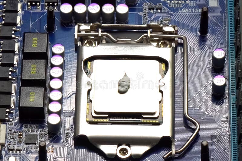 Drawing Thermal Paste on Computer Processor. Installing a Coolin Stock ...