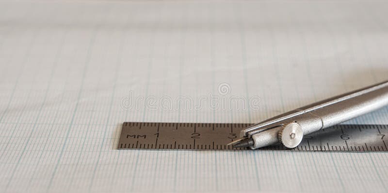 Engineering Concept. Divider on Graph Paper Background Stock Image ...