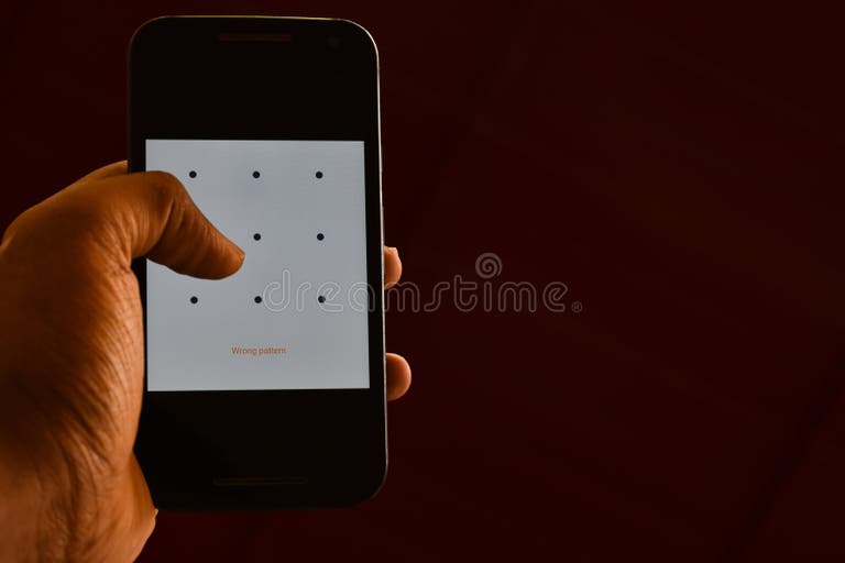 Drawing Unlock Pattern on a Smart Phone. Concept about Smart Phone ...