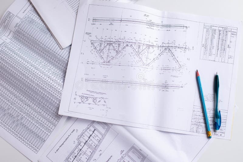 Drawings of a Construction Engineer on a Sheet of Paper Stock Photo ...