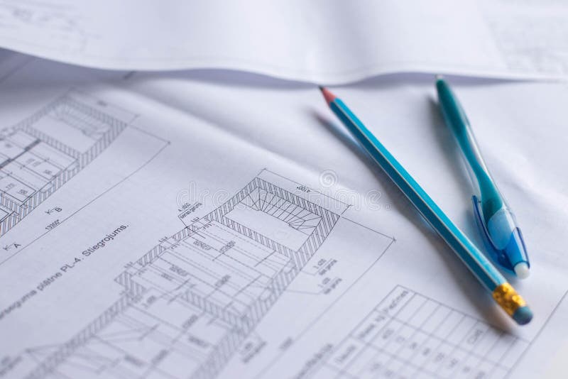 Drawings of a Construction Engineer on a Sheet of Paper Stock Image ...