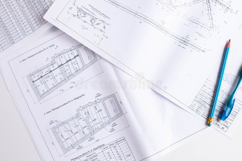 Drawings of a Construction Engineer on a Sheet of Paper Stock Photo ...