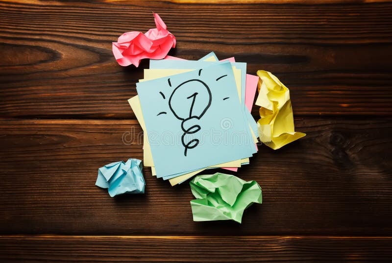 Drawn Light Bulb Sticky Note Surrounded by Crumpled Paper Stock Photo ...