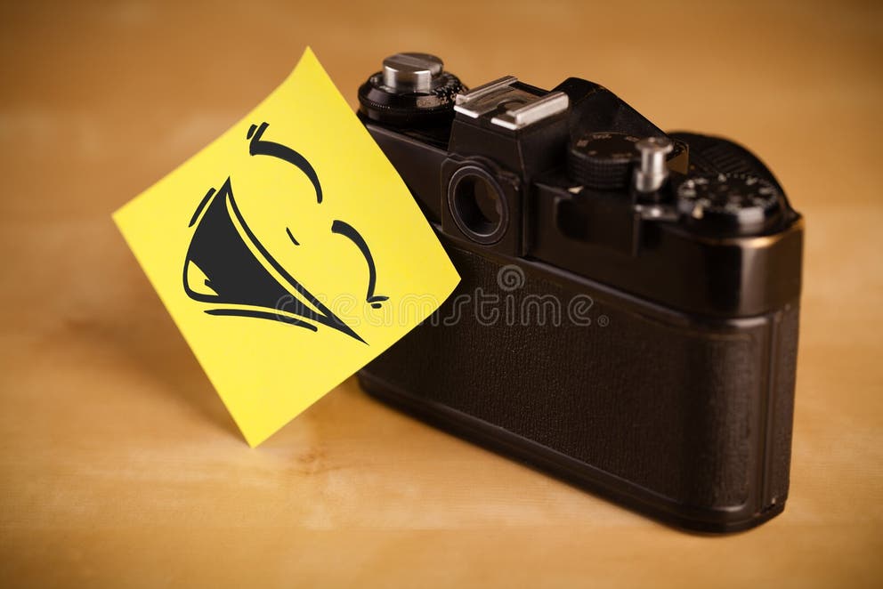 Post-it Note with Smiley Face Sticked on Photo Camera Stock Image ...