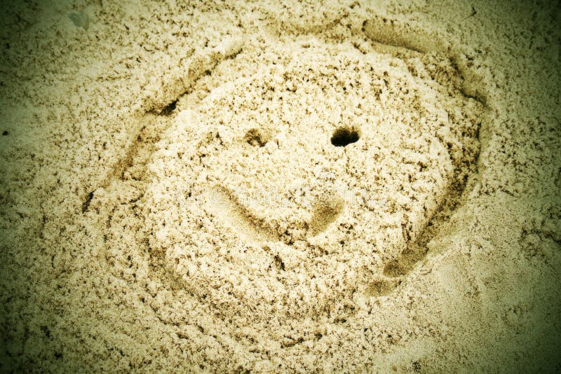 Drawn Smiley Face in Summer Beach Sand. Painted Head in Dray Salt Sand ...