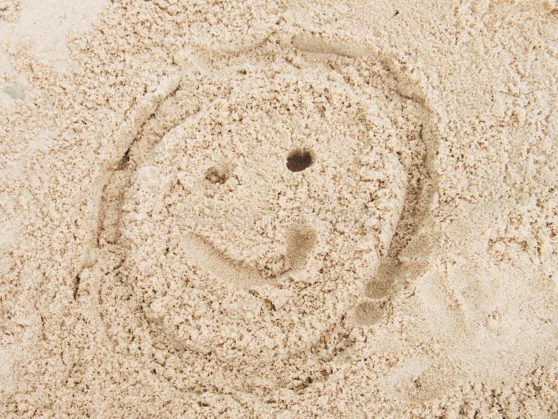 Drawn Smiley Face in Summer Beach Sand. Painted Head in Dray Salt Sand ...