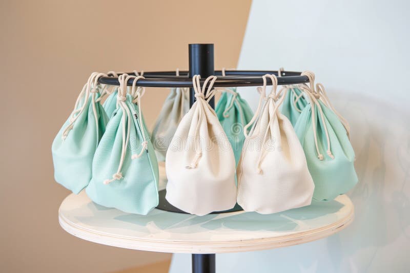 Drawstring Beach Bags Presented on a Spinning Display Rack Stock Image ...