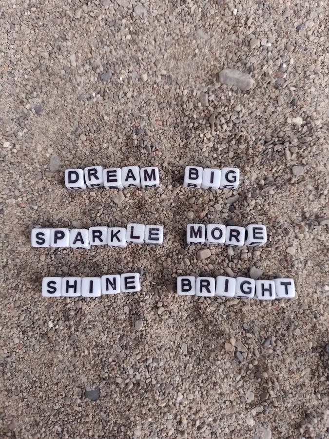 Dream Big Sparkle More Shine Bright Written on Sand at the Beach Stock ...