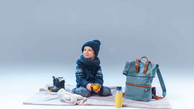 Dreaming, Smiling Little Boy Sitting on Blanket and Having Rest, Drinks ...