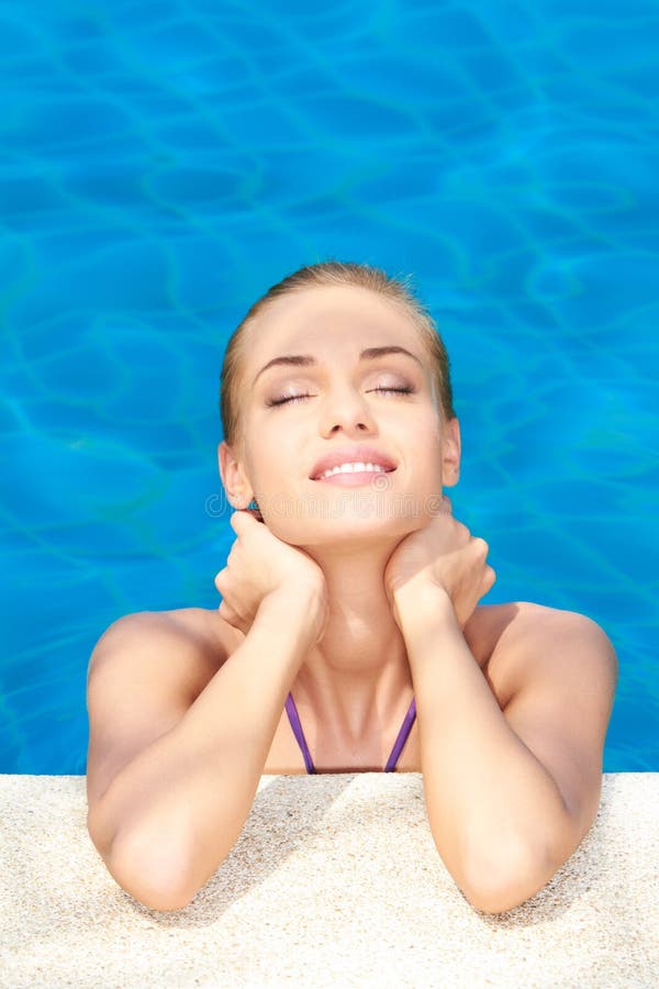 Happy Woman Relaxed in a Swimming Pool Enjoying Vacations Stock Image ...
