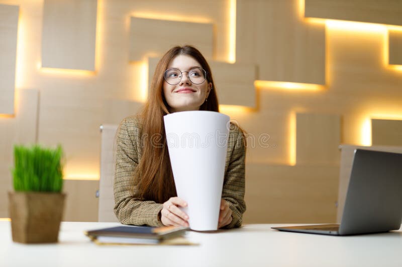 Dreamy Happy Woman Sitting at Workplace with Documents, Positive Mood ...
