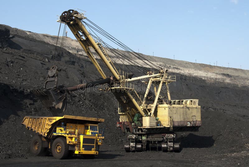 Loading of iron ore stock photo. Image of machinery, industry - 10868210