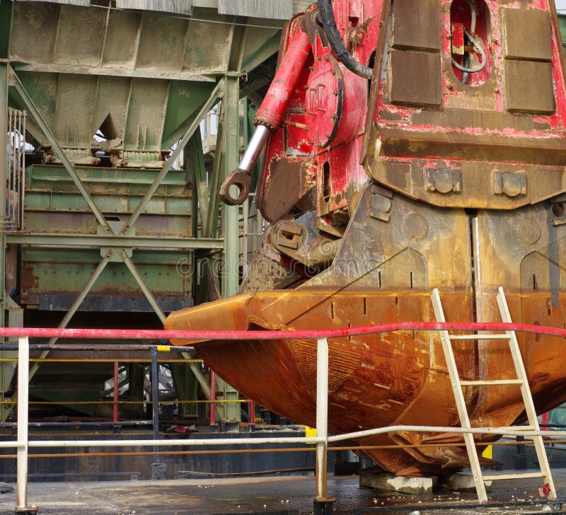 Dredge Clamshell Bucket Unloading Gravel in the Water of a Port Stock ...