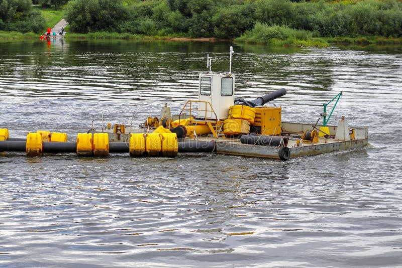 Dredging on a river stock image. Image of boat, rain - 228968199