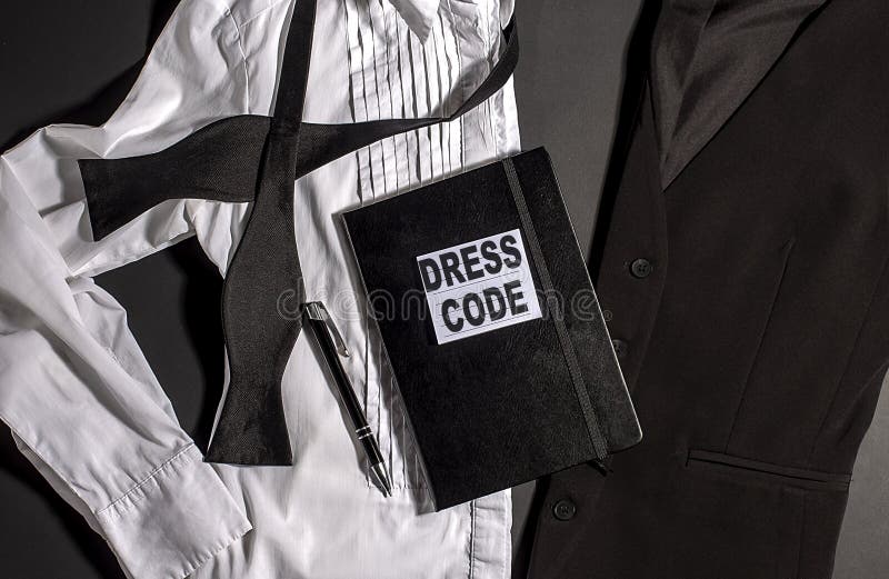 DRESS CODE Text on Notepad with Black and White Clothes Stock Image ...