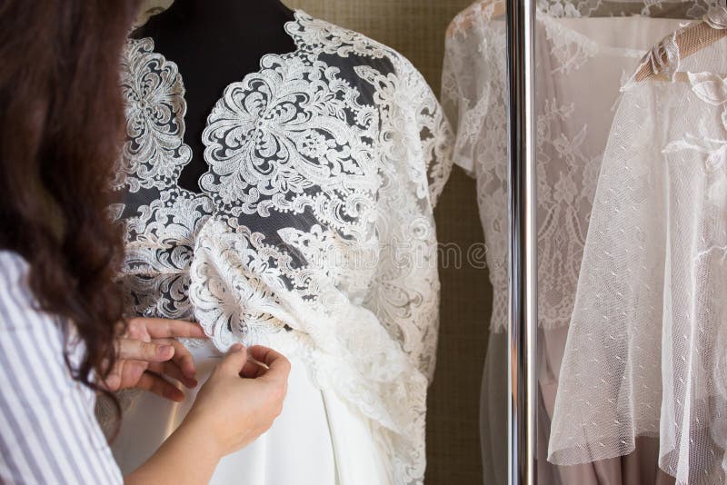 Dress Designer Making Lace Wedding Dresses. Stock Image - Image of ...