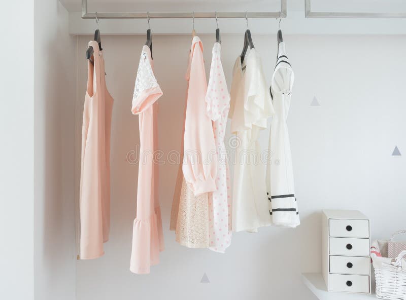 Dress hanging on rail stock image. Image of design, rack - 67235897