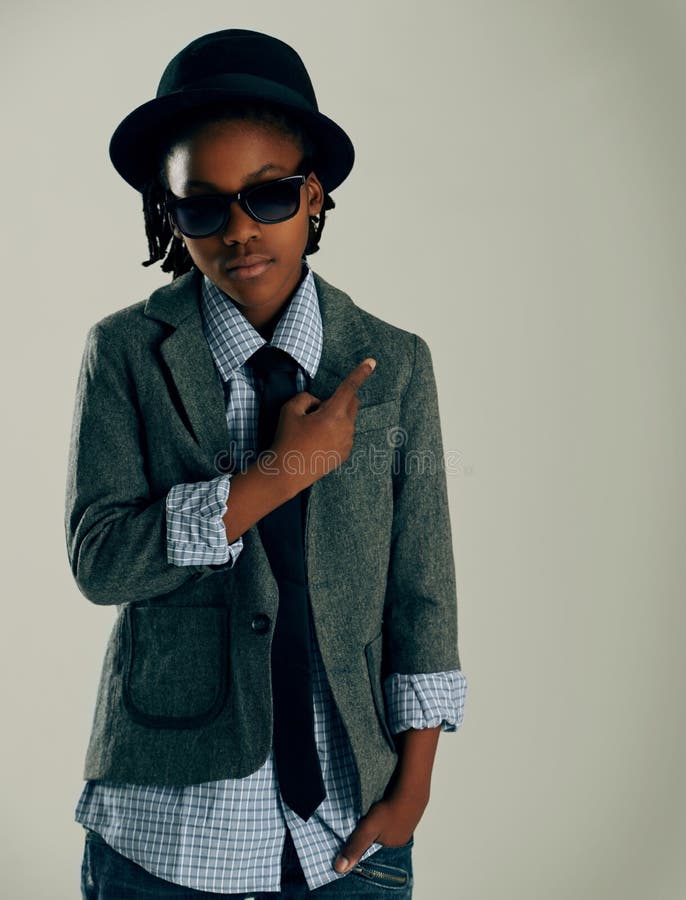 Dressed in His Best. Studio Portrait of a Young Ethnic Boy with a Funky ...