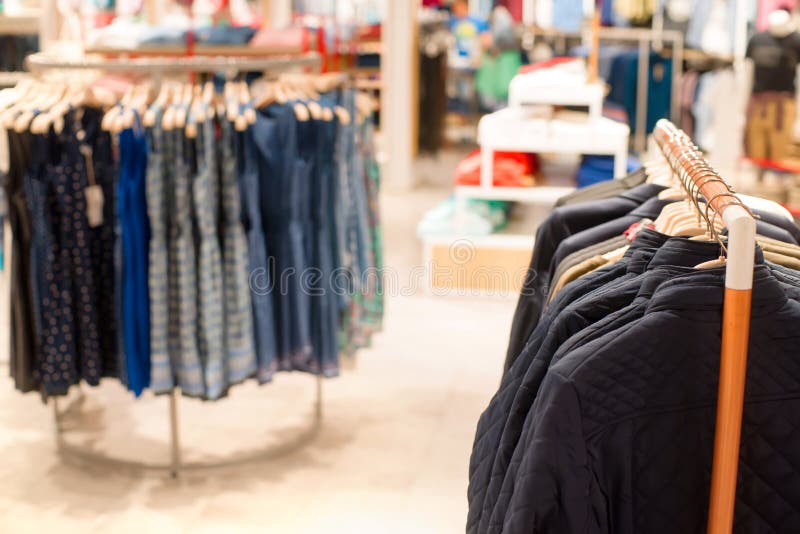 Dresses and Jackets on Hangers in a Clothing Store Stock Image - Image ...