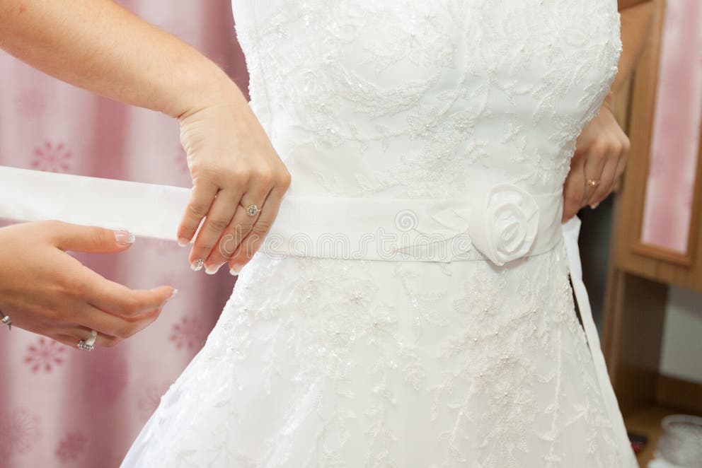 Dressing the bride dresses stock photo. Image of dressing - 36498506