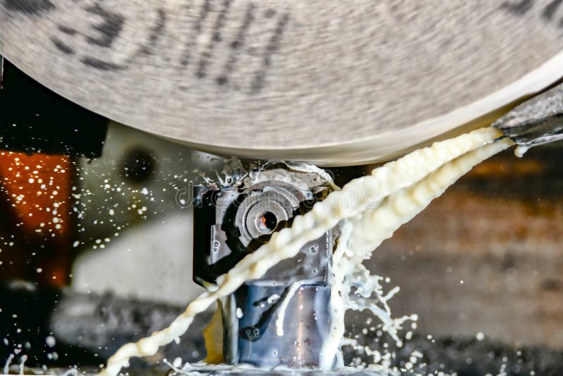 Dressing of the Grinding Wheel with a Diamond Roller with Coolant ...