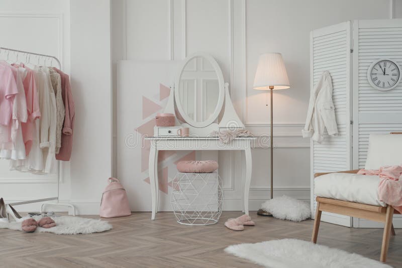 Dressing Room Interior with Clothing Rack and Round Mirror Stock Photo ...