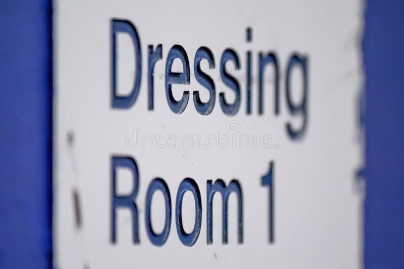 A Dressing Room Sign on a Wall at a Sports Facility Stock Photo - Image ...