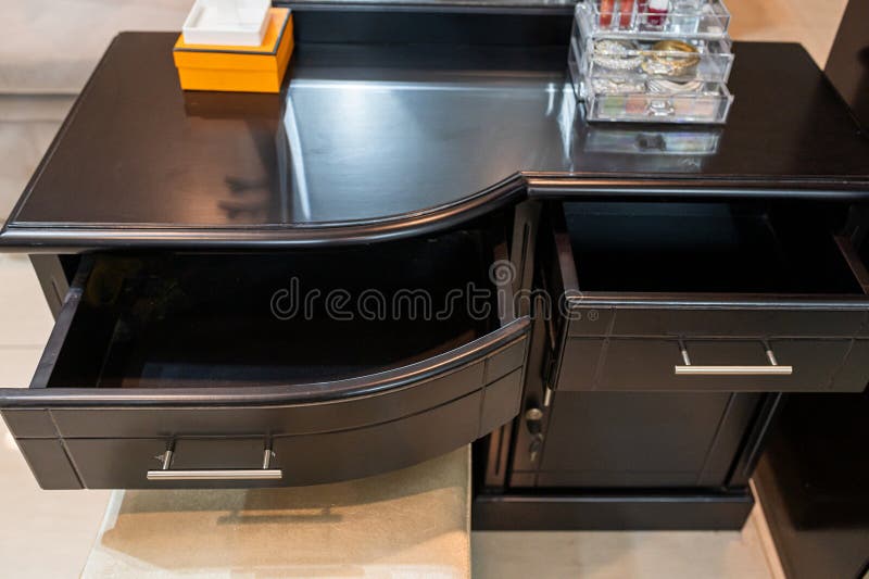 A Dressing Table in Wood Color Complete with Open Wardrobe Editorial ...
