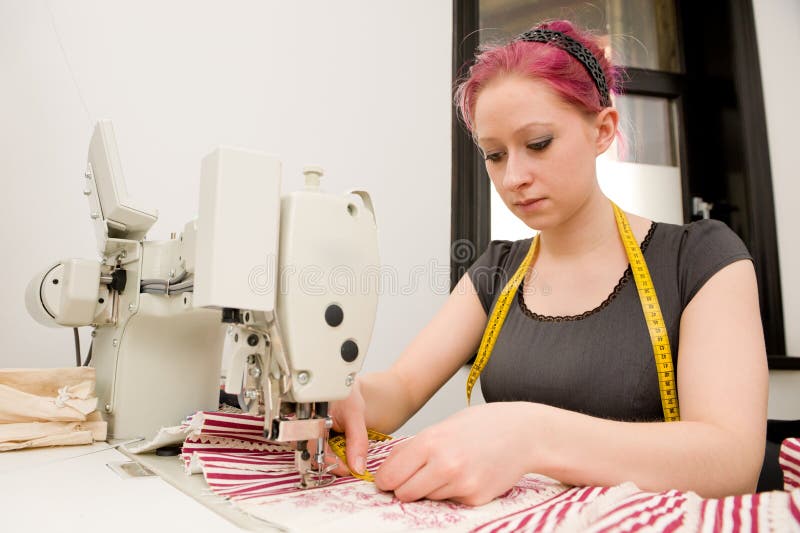 Interior of Dressmaker Shop with Dressmaking Working Desk and Hanging ...