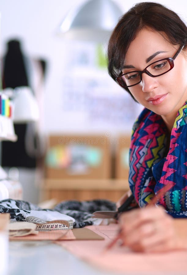 Dressmaker Designing Clothes Pattern on Paper Stock Image - Image of ...