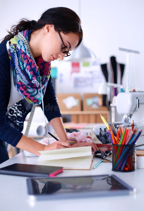 Dressmaker Designing Clothes Pattern on Paper Stock Image - Image of ...