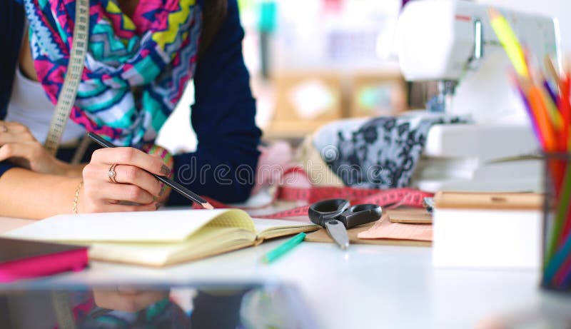 Dressmaker Designing Clothes Pattern on Paper Stock Photo - Image of ...