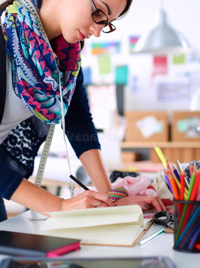 Dressmaker Designing Clothes Pattern on Paper Stock Photo - Image of ...