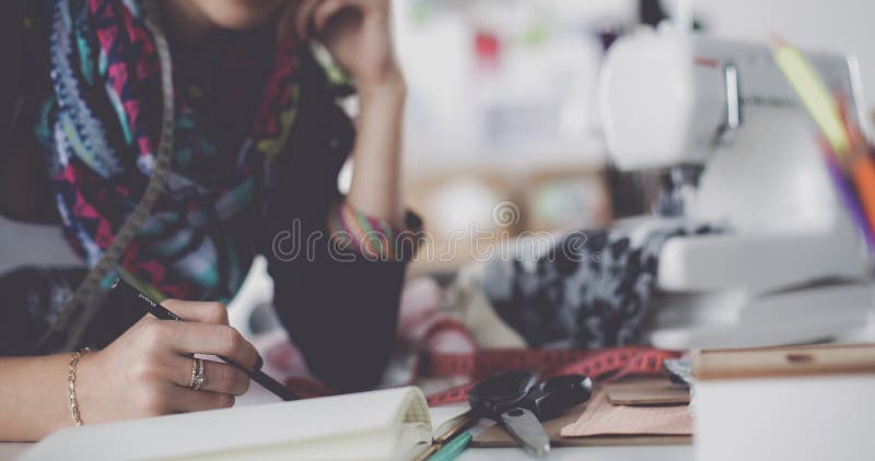 Dressmaker Designing Clothes Pattern on Paper Stock Photo - Image of ...