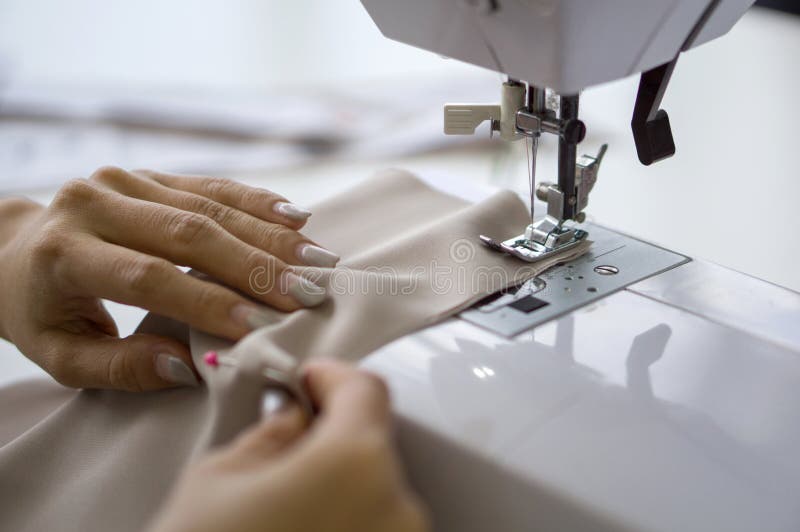 The Dressmaker Elaborately Made a Thread Pattern on a Fine Beige Fabric ...