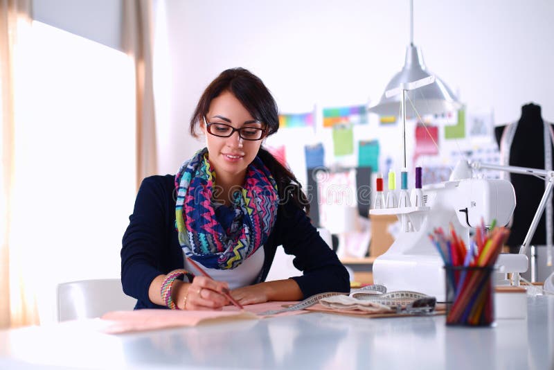 Dressmaker Woman Designing Clothes Pattern on Paper Stock Photo - Image ...