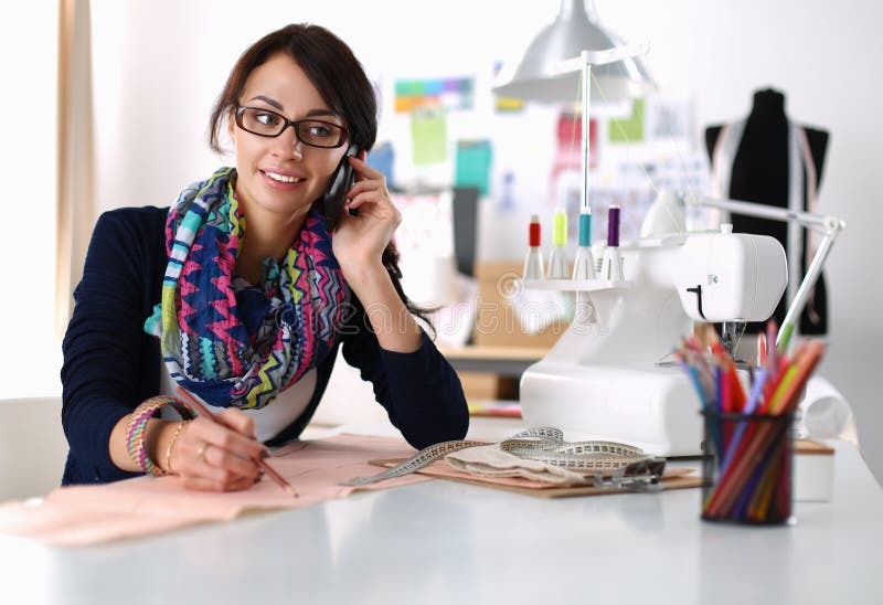 Dressmaker Woman Designing Clothes Pattern on Paper Stock Image - Image ...