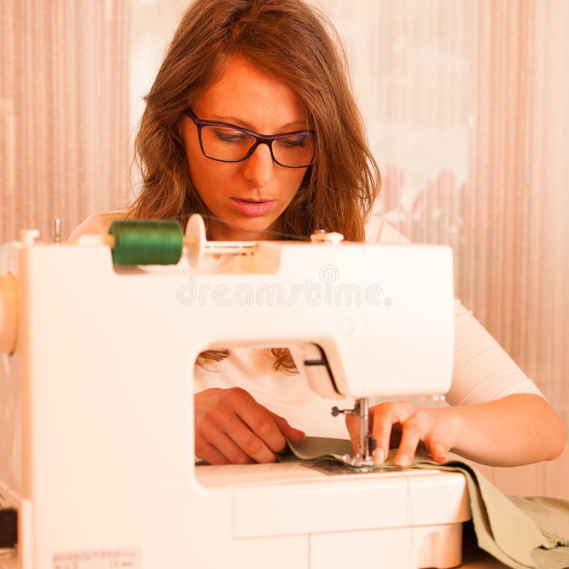 Dressmaker Woman Working with Sewing Machine Stock Photo - Image of ...