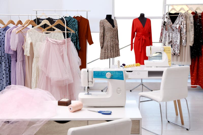 Dressmaking Workshop Interior with Stylish Female Clothes and Equipment ...