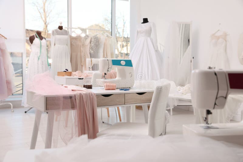Dressmaking Workshop Interior with Wedding Dresses and Equipment Stock ...